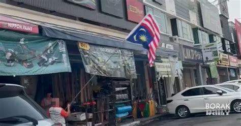 Isu Jalur Gemilang Terbalik Pemilik Kedai Bebas Dengan Jaminan Polis