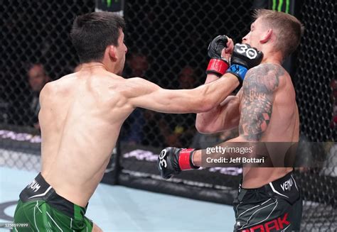 Steve Erceg Of Australia Punches David Dvorak Of The Czech Republic