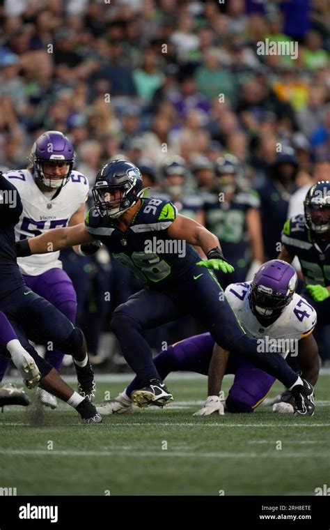 Seattle Seahawks Linebacker Levi Bell 98 Prepares For A Tackle During