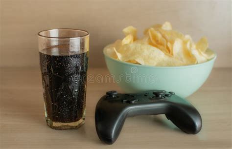 Stacked Potato Chips Game Controller And Soda Leisure Time Concept Stock Image Image Of