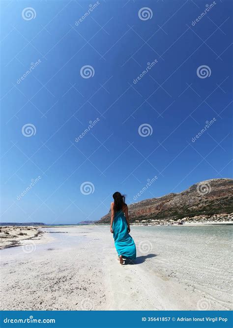 Girl Walking On The Beach In A Turquoise Dress Stock Image Image Of