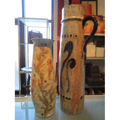 A Studio Pottery Vase With Seahorse Design Marked Am Greengrass To