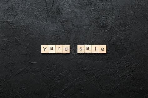 Yard Sale Word Written On Wood Block Yard Sale Text On Cement Table For Your Desing Top View