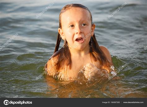 Girl Having Fun Bathing In The Sea Stock Photo MakALEX 184367350