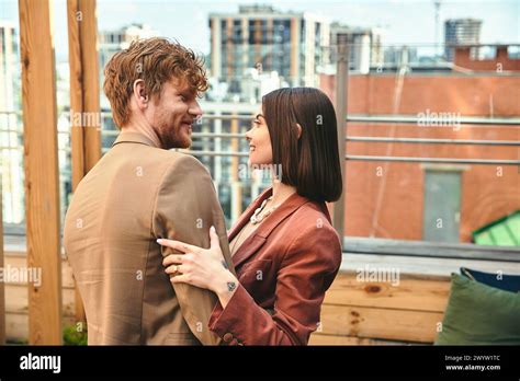 A Man And A Woman Standing Side By Side Embodying Unity And Diversity