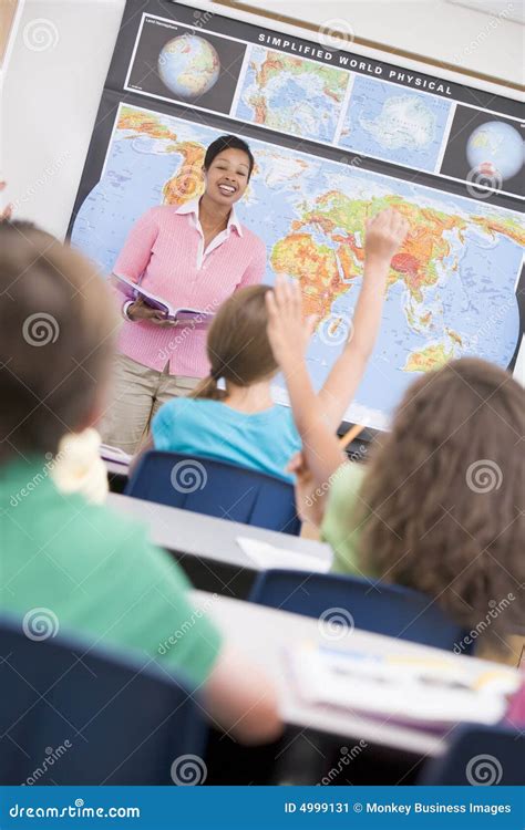 Teacher In Elementary School Geography Class Stock Image Image Of