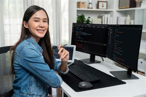 Premium Photo Young Asian In It Developer Looking At Camera To Present On Pc Stratagem