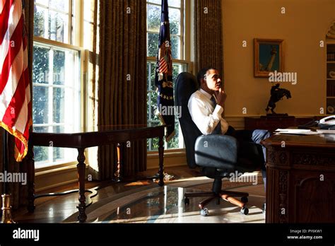 President Barack Obama In The Oval Office On His First Day In Office 1