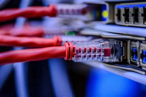 Premium Photo Lan Fiber Optic Cable Connected To The Server Switch For Optimized Network