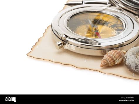 Seashell And Compass On Old Paper Isolated At White Background Stock