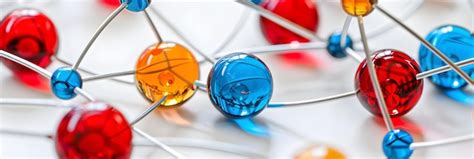 Colorful Orbiting Electrons Around Atomic Structure Premium Ai