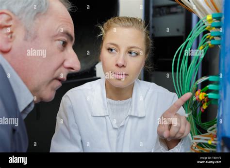 Engineer Woman In Network Server Room Stock Photo Alamy