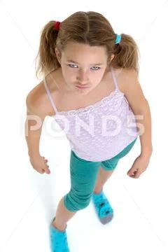 Photograph Preteen Girl Looking Up At Camera 145290227