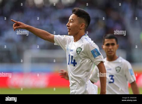 Uzbekistans Abbosbek Fayzullaev Celebrates After Scoring Against New
