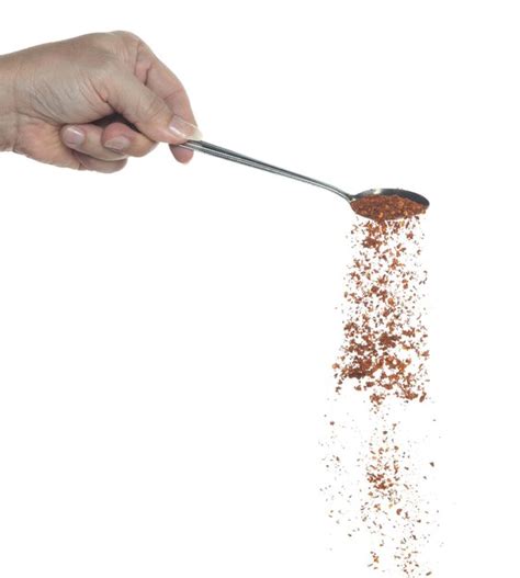 Premium Photo Red Hot Chilli Flying Explosion Red Grain Chilli Explode Abstract Cloud Fly Seed