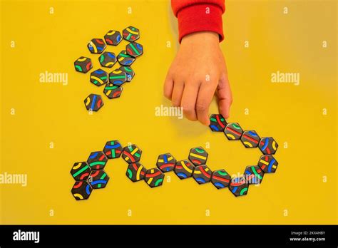 tantrix is a hexagonal tile based abstract game invented by mike