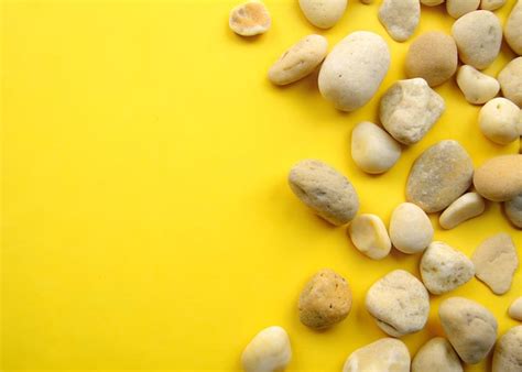 Premium Photo A Yellow Background With Many Small Clumps Of Peanuts On It