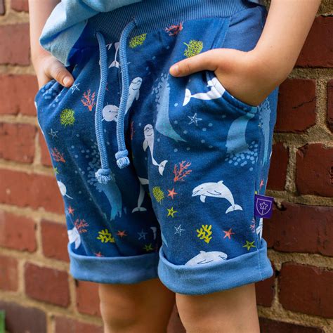 Deep Sea Dreaming Dolphins Drawstring Cuffed Shorts With Pockets