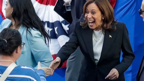 Kamala Harris Points Hecklers To Smaller Trump Rally Nearby