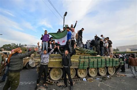 Rebel Forces Capture Damascus As Syrian President Flees Egyptian Streets