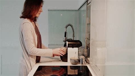 Woman At Home Closing Shutter By Stocksy Contributor Milles Team Stocksy Woman At Home Closing Shutter By Stocksy Contributor Milles Team Stocksy