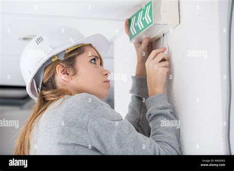 Lighted Wall Mounted Exit Sign Stock Photo Alamy