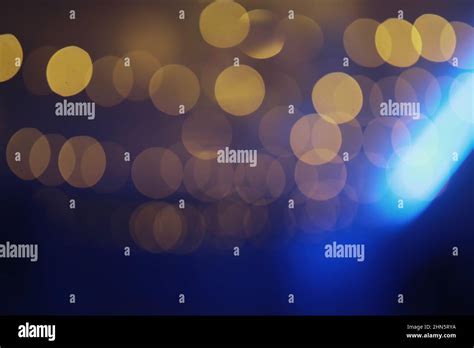 Abstract Bokeh Background Golden Bokeh Circles On A Dark Blue