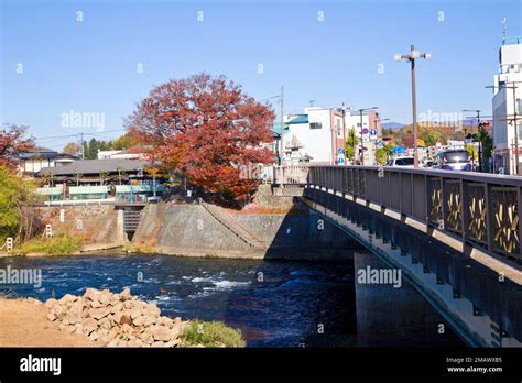 Mount Iwate Scene With Buildings And Promenade At Katakami River In Morioka City Iwate