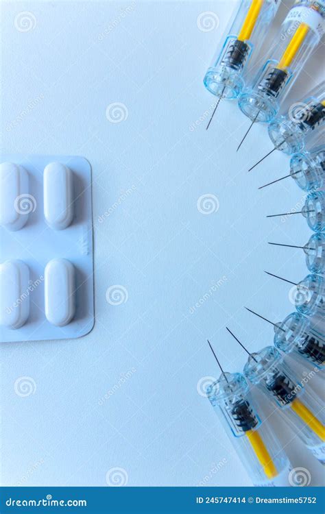 Combination Of Pills And Injections As New Medical Vaccines Ready For Injection With Syringe And
