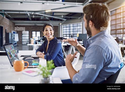 Theyre Not Afraid To Go Big With Their Ideas Two Young Designers Working In An Office Stock