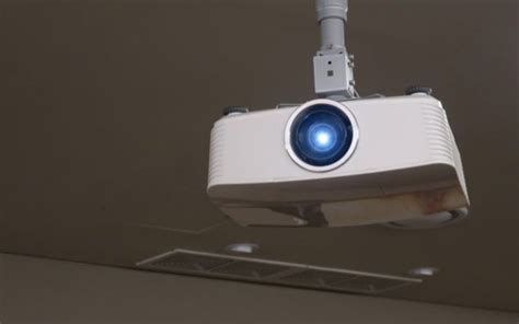 how to flip images on an optoma projector pointer clicker