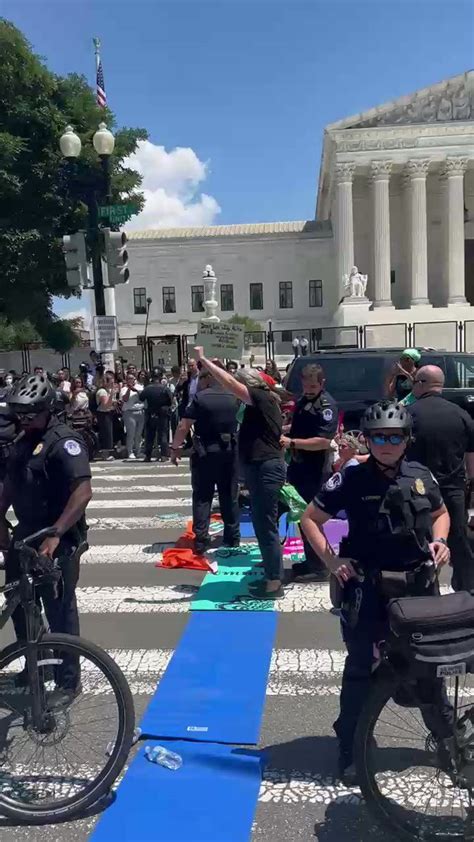 AOC Pretended To Be In Handcuffs When She Was Escorted Away From The Supreme Court Washington