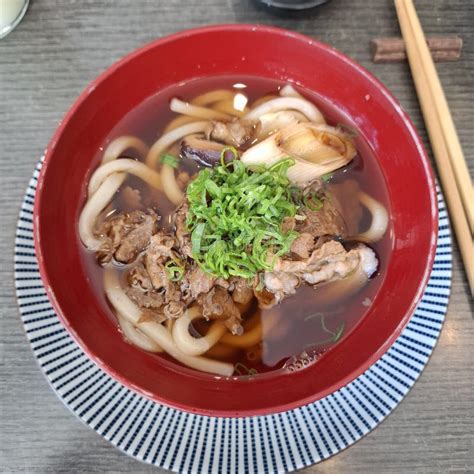 Bowl Of Japanese Udon Soup Served With Beef Shiitake Mushrooms