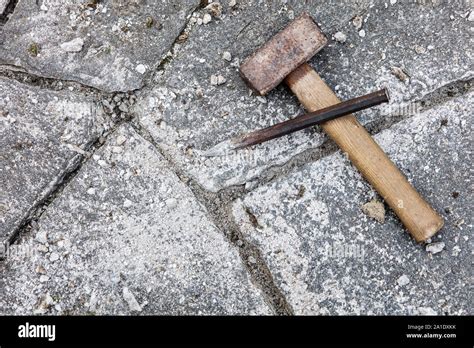 Hammer And Chisel Logo