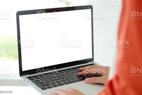 Man Hands Typing Laptop Computer With Blank Screen For Mock Up Template Background Business