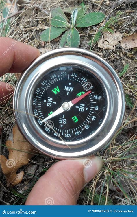 A Round Compass Lies On The Ground Stock Image Image Of Journey