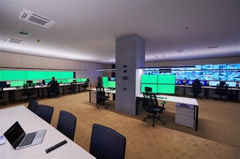 Premium Photo Group Of Security Data Center Operators Working In A