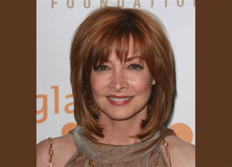 Sharon Lawrences Medium Length Red Hair With Pink Undertones