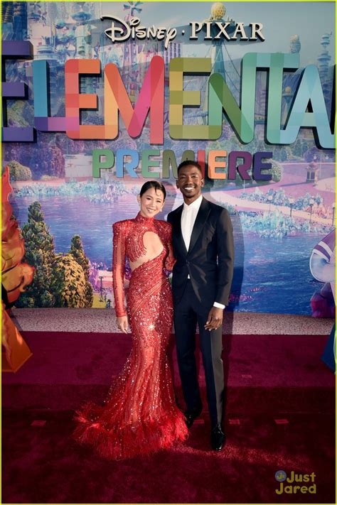 Leah Lewis And Mamoudou Athie Pose With Their Characters At Elemental