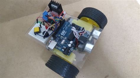 Arduino Obstacle Avoiding Robot Arduino Arduino Projects Cool Arduino Projects