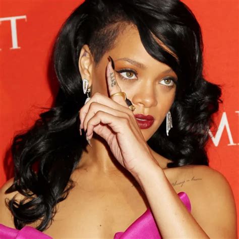Rihannas Tattoo Collection A Complete Guide To The Pop Icons Body