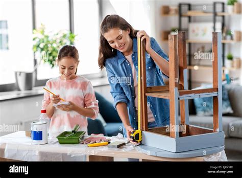 Mother And Babe With Ruler Measuring Old Table Stock Photo Alamy