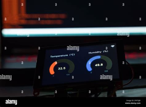 Using Notebook Computer To Upload Program To The Microcontroller With Lcd Monitor And The
