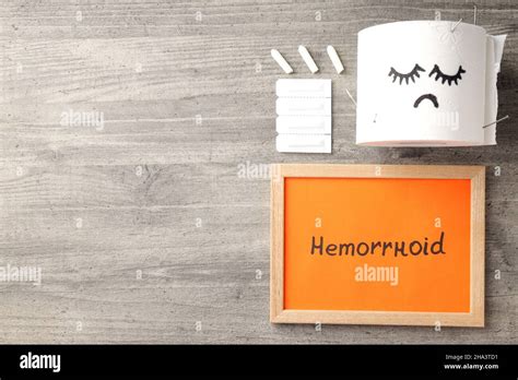 Concept Of Healthcare With Hemorrhoids Accessories On Gray Textured
