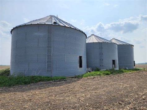 3 Grain Bins 2 Gsi And Butler 15000 Bushel Bins And 1 18000