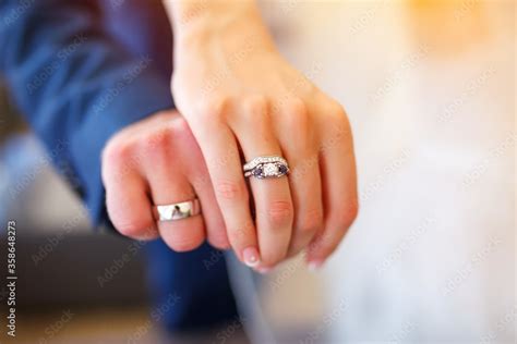 Engagement Ring Holding Hands