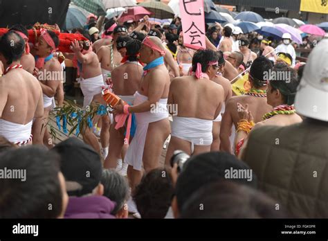 Participants Of The Naked Man Festival Are Arriving At The Main Gate Of