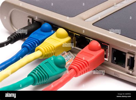Ethernet Cables Plugged Into Router Against White Background Stock