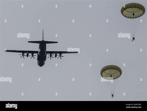 A Group Of U S Army And European Paratroopers Conduct An Airborne Jump