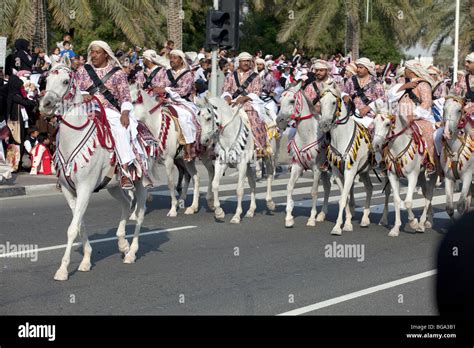 Qataris Dressed As Old Time Cavalry Are Applauded By Crowds During The Qatar National Day Parade